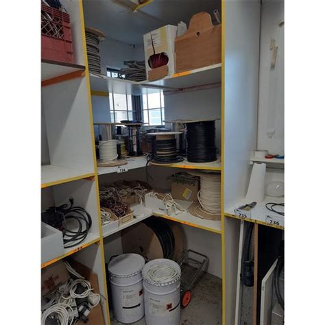4 Shelves Of Assorted Electrical Equipment And Cabling