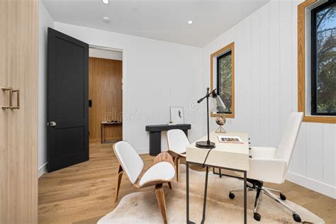 Modern Workspace With A Wooden Desk And Chairs Editorial Photo Image Of Furniture Design