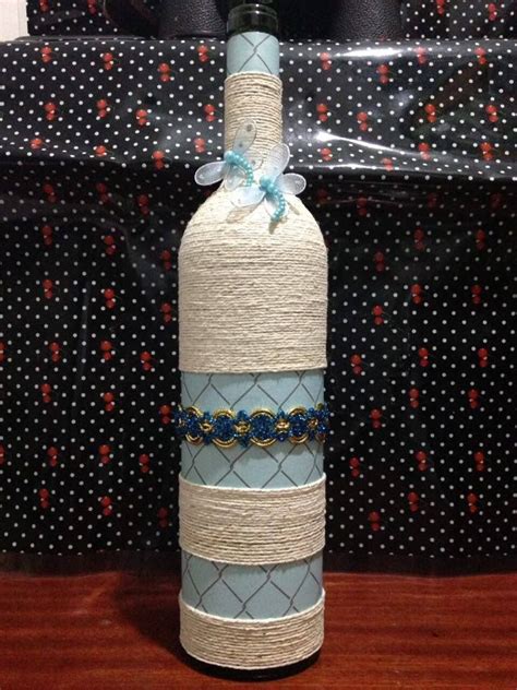 Garrafa Decorada Feita Com Barbante E Decoupage Garrafas Decoradas Artesanato De Garrafa