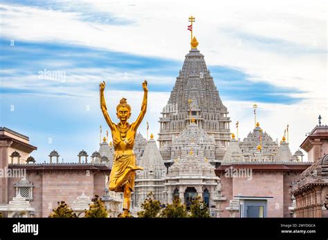 Statue Of Nilkanth Varni With Akshardham Mahamandir Temple In The Back At Baps New Jersey Usa