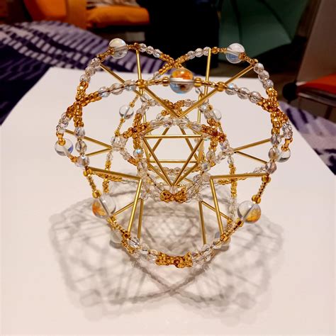 Sphere Made Of Beads With Octahedron Inside Might Seem Chaotic But