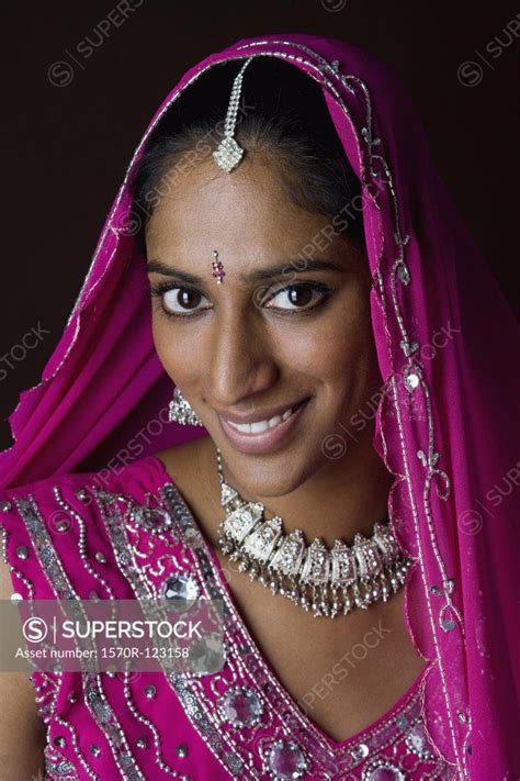 A Woman Dressed In Traditional Indian Clothing Superstock