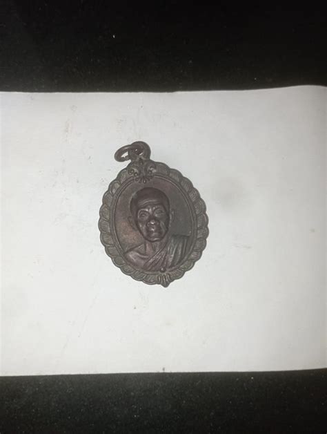 เหรียญหลวงพ่อคูณวัดบ้านไร่ รุ่นศริมงคลกูให้รวย Ennxo