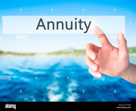 Annuity Hand Pressing A Button On Blurred Background Concept