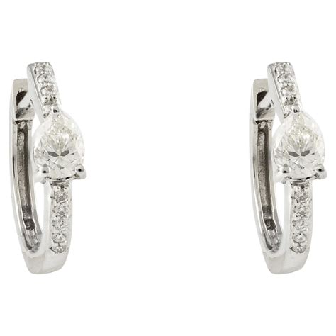 18k Solid Gold Diamond Huggie Hoop Tiny Diamond Hoop Earring For Sale