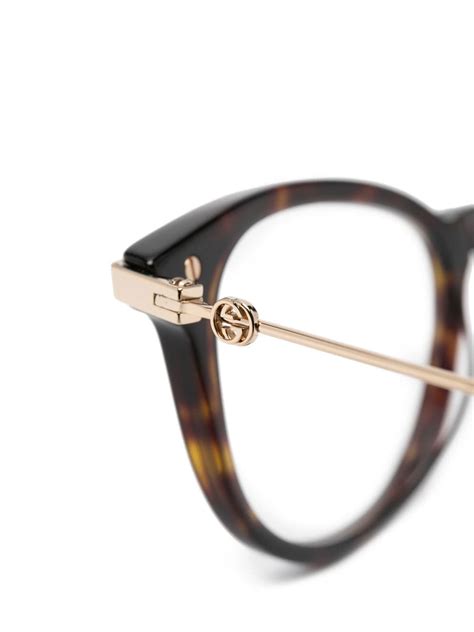 Gucci Eyewear Round Frame Optical Glasses Brown Farfetch Uk