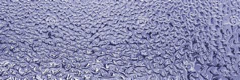 Abstract Glass Texture With Natural Water Condensation Toned In Blue