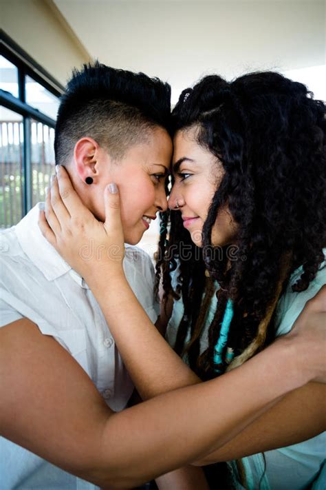 Lesbian Couple Embracing Each Other And Smiling Stock Image Image Of