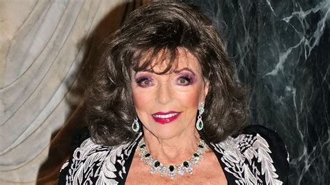 Joan Collins Dazzles In Silhouette Skimming Flirty Dress Hello