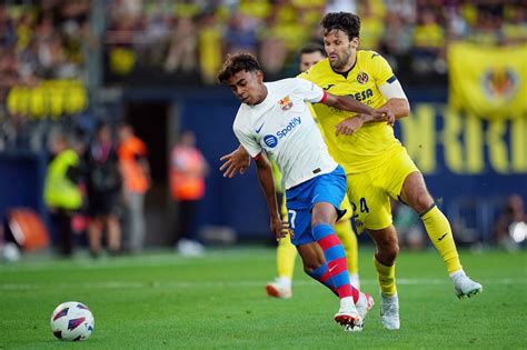 لامین یامال 11 ساله در کنار لیونل مسی و لوییس سوارز عکس طرفداری