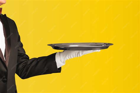 Premium Photo Elegant Waiter Hand In White Glove Holding Plate With Note