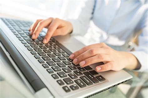 Premium Photo Closeup Shot Of A Female Learner Typing On The Laptop Keyboard