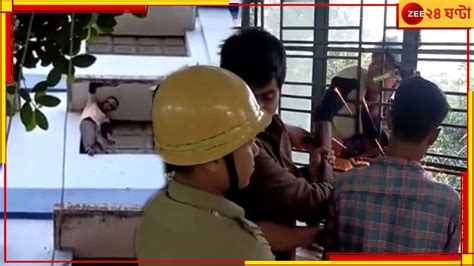 Tufanganj জানালা গলে তিনতলার কার্নিসে ঝুলছে মানসিক ভারসাম্যহীন যুবক তুলকালাম হাসপাতাল Fire