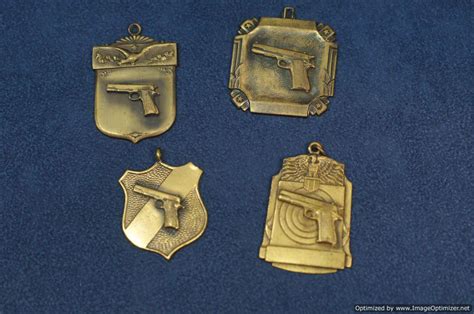 Smgl 2821 4pc Set Of Pistol Badges By Blackinton War Relics Buyers