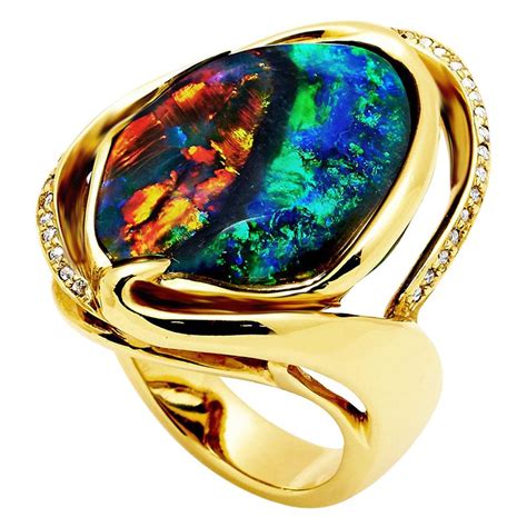 Customizable Rainbow Black Australian Opal Ring With Sapphires And 18ct