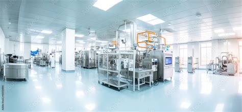 Large Brightly Lit Hall With Metal Tanks And Lab Equipment Inside Of