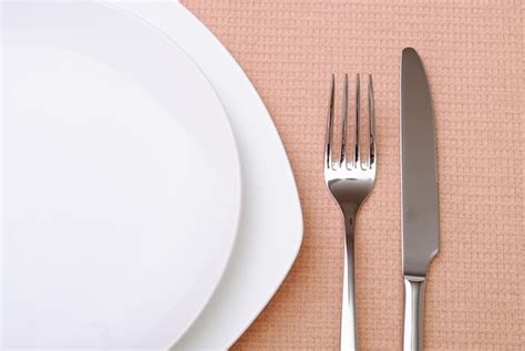 Premium Photo Table Settings On A Napkin On The Table