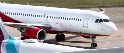 Plain Passenger Airplane On The Ground Panorama Stock Image Image Of