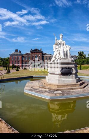 Statue Of Queen Victoria And Kensington Palace Kensington Gardens London England UK Stock