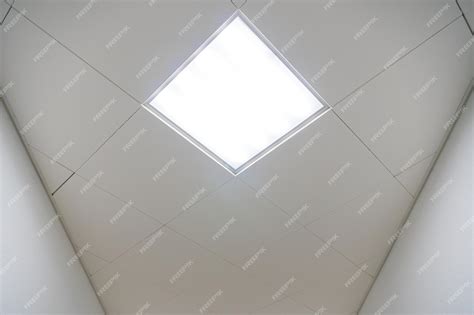 Premium Photo Square Lamp On A White Office Ceiling Interior Design