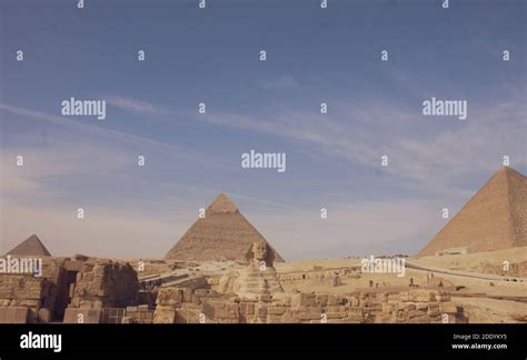 Landscape Of Sphinx And Pyramids Behind Stock Photo Alamy