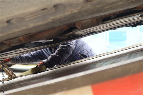 Welder Working A Colombian Man Operates A Crane While Working