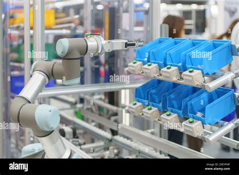 robotic arm integrated into an automated assembly line illustrating