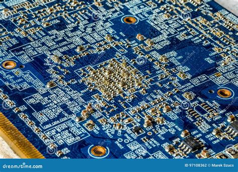 Blue Circuit Board Pcb With Many Microscopic Electronic Parts Stock