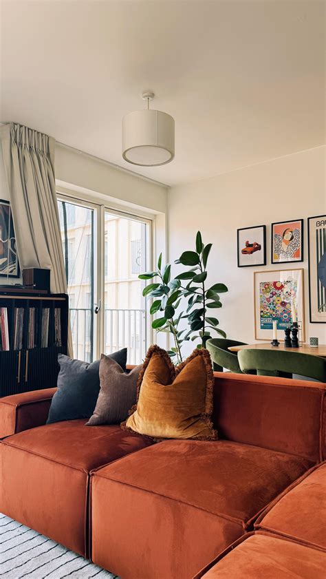 Warm Neutral Living Space With Burnt Orange Sofa Living Room Design