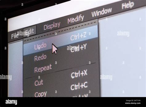 Software Menu With Undo Command And Mouse Cursor On It Stock Photo Alamy