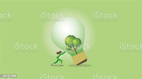 한 사업가가 큰 나무 전구를 밀고 있다 Esg 아이디어 재생 가능 대체 에너지 환경 정책 순 배출 제로 탄소 발자국 감소 지속