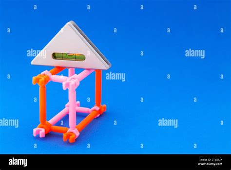triangular bubble level on a structure made up of plastic pieces stock