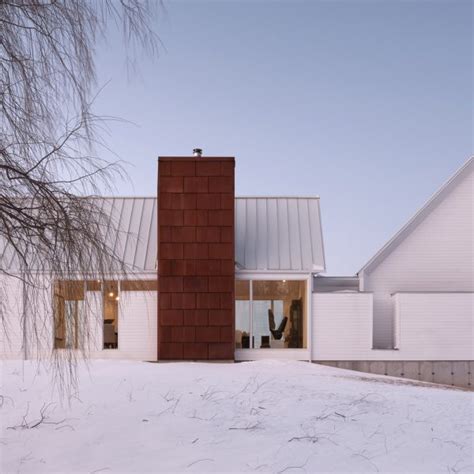 Bldg Workshop Places Steel Details On All White Home In Rural Ontario