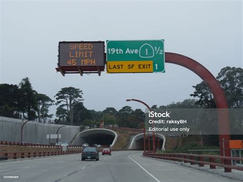 Directional Signs To A Tunnel Heading To 19th Avenue With Speed Limits