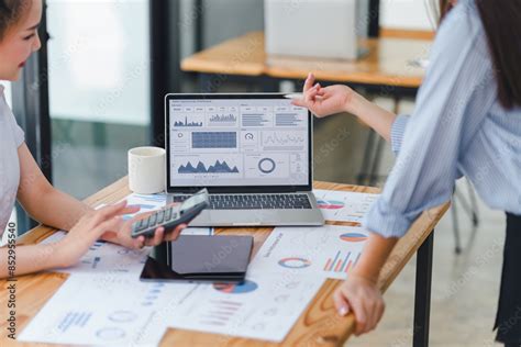 Professional Analyzing Financial Data Graphs Charts On Laptop Display