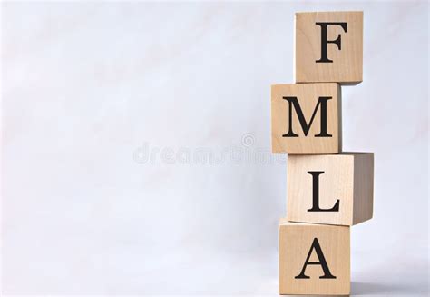Fmla Acronym On Wooden Cubes On A White Background Stock Image