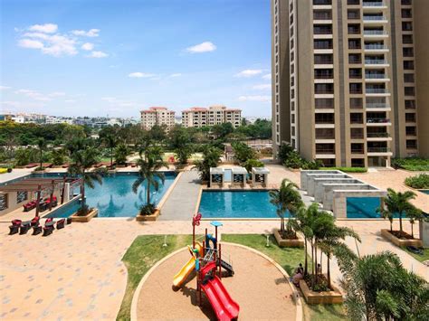 Image Of Swimming Pool Of The Advantage Raheja Pebble Bay Rmv Bangalore