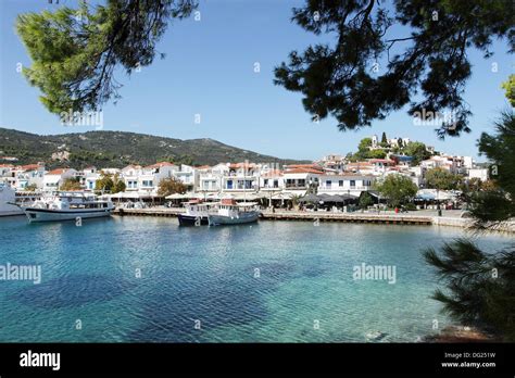 Skiathos Town And The Old Harbor On The Greek Island Of Skiathos A