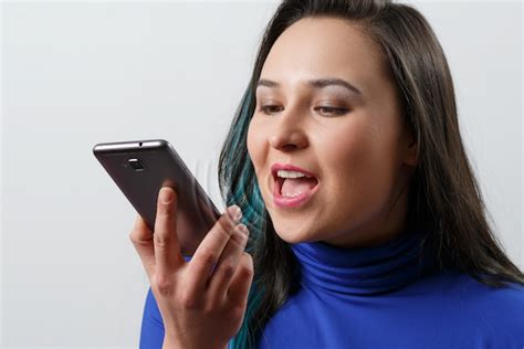 Premium Photo Women Using The Voice Recognition Function Phones Technology