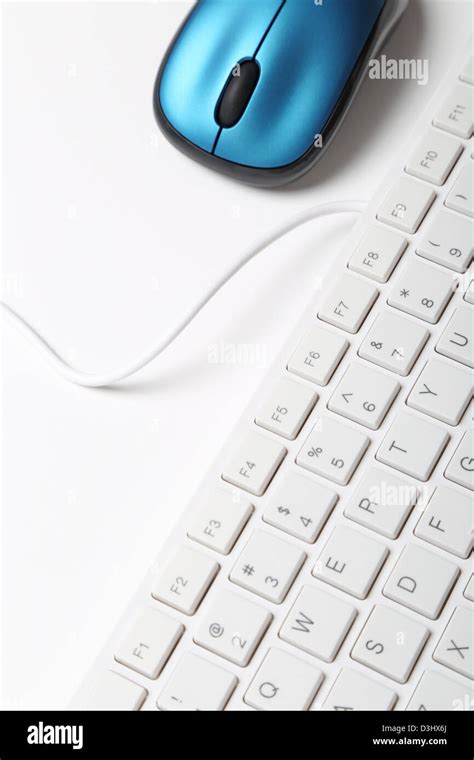 White Keyboard And Blue Mouse Stock Photo Alamy