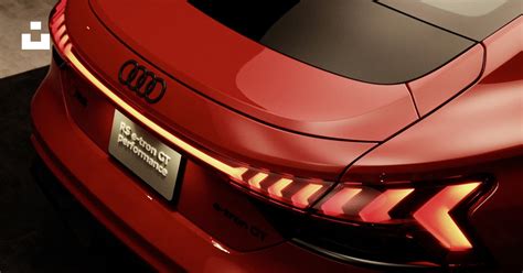 빨간 차가 차고에 주차되어 있습니다 사진 Unsplash의 무료 자동차 이미지