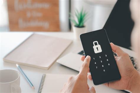 Premium Photo Hacking A Phishing Mobile Phone With A Password To