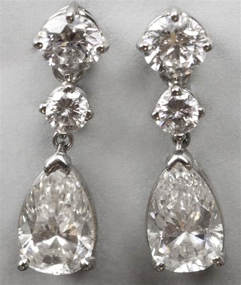 Lot 14k White Gold Diamond Drop Earrings