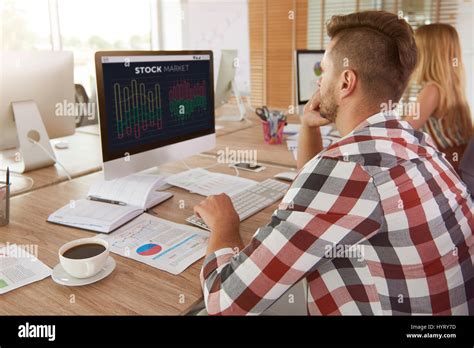 Man Analyzing Some Data On Computer Stock Photo Alamy