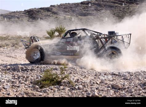 March 27 2010 The Class 12 Buggy Of Jerry Longo 1209 Emerges From The Silt And Rocks As He
