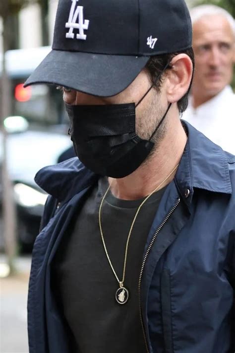 Leonardo Dicaprio And Tobey Maguire Wore Matching Wolf Necklaces And