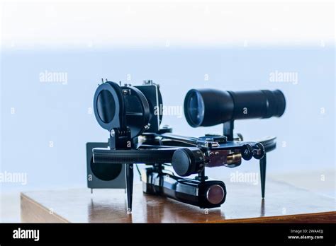 Nautical Black Sextant Placed On Wooden Box In Navigational Bridge Navigational Equipment