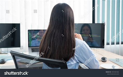 Asian Woman Programmer Typing Source CodeẢnh Có Sẵn1907401402