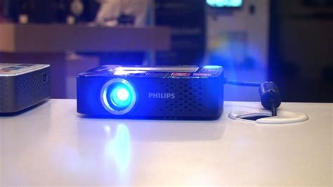 Picopix Projector Gives You A Big Screen In A Small Package Cnet Picopix Projector Gives You A Big Screen In A Small Package Cnet