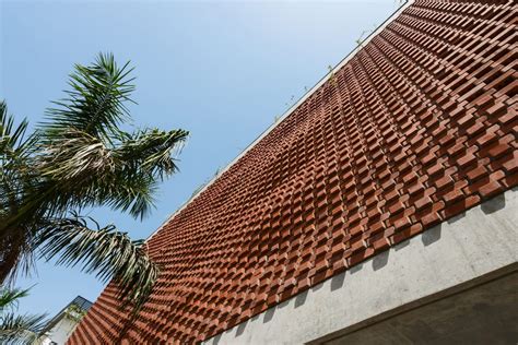 Rippling Red Brick Facade Shades House In Surat By Design Work Group